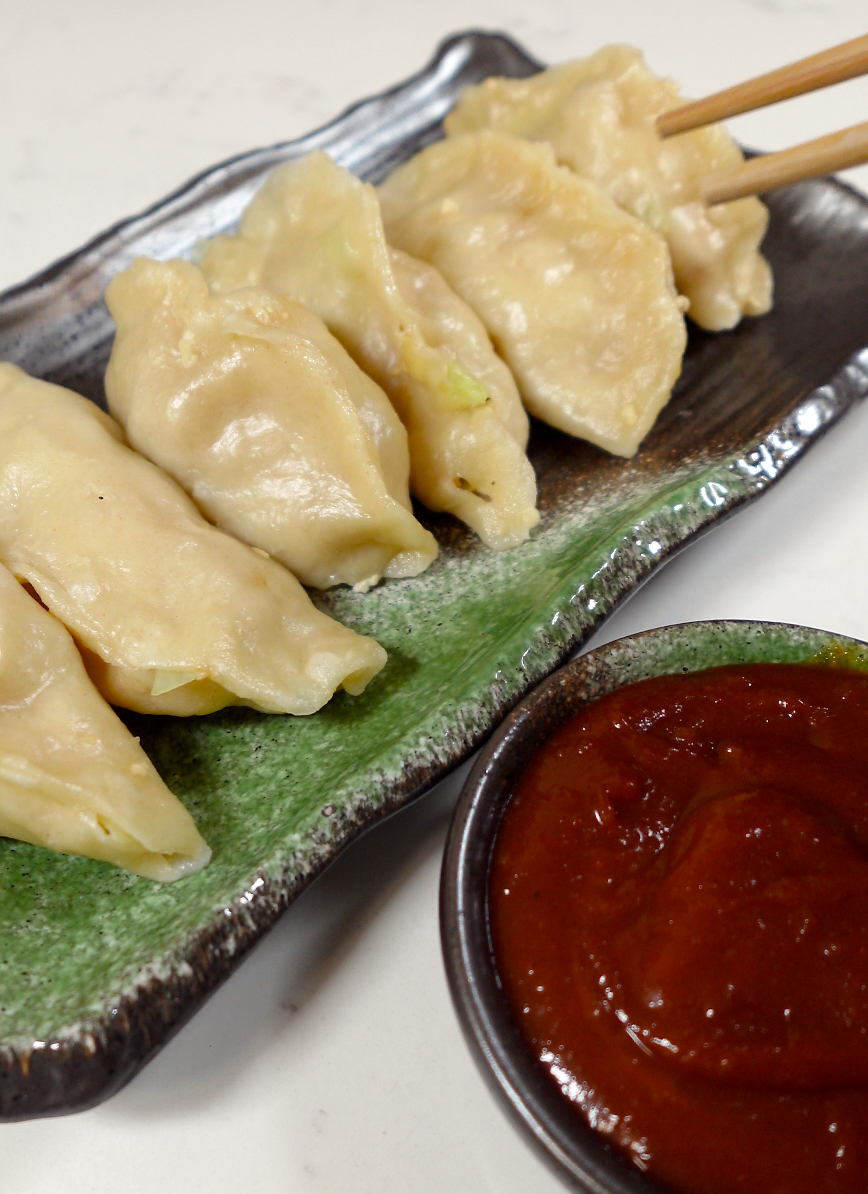 Tofu & Cabbage Dumplings with Gochujang Sauce - Plant Forward Sabrina