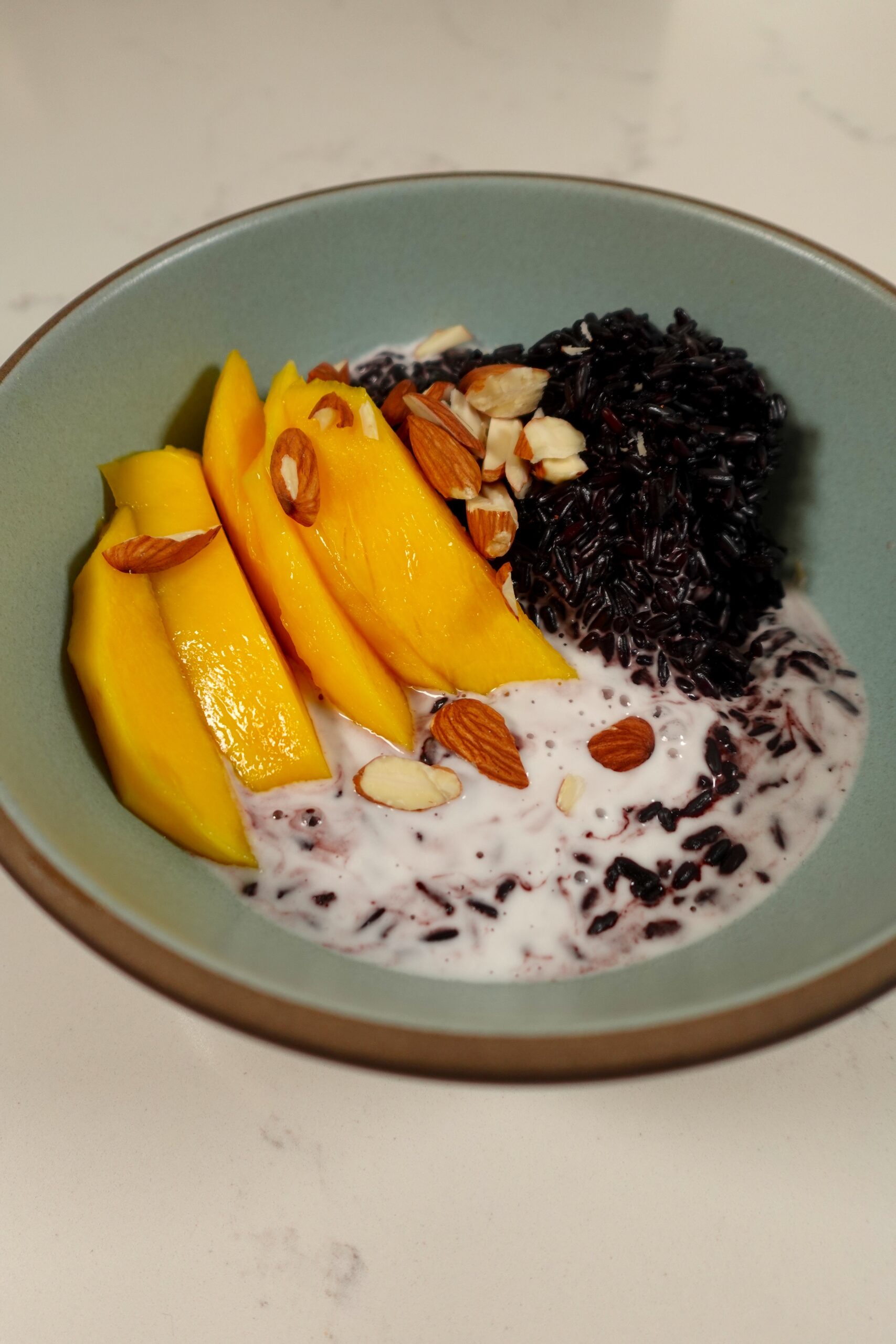 Purple Rice Pudding with Coconut Milk and Mango - Plant Forward Sabrina